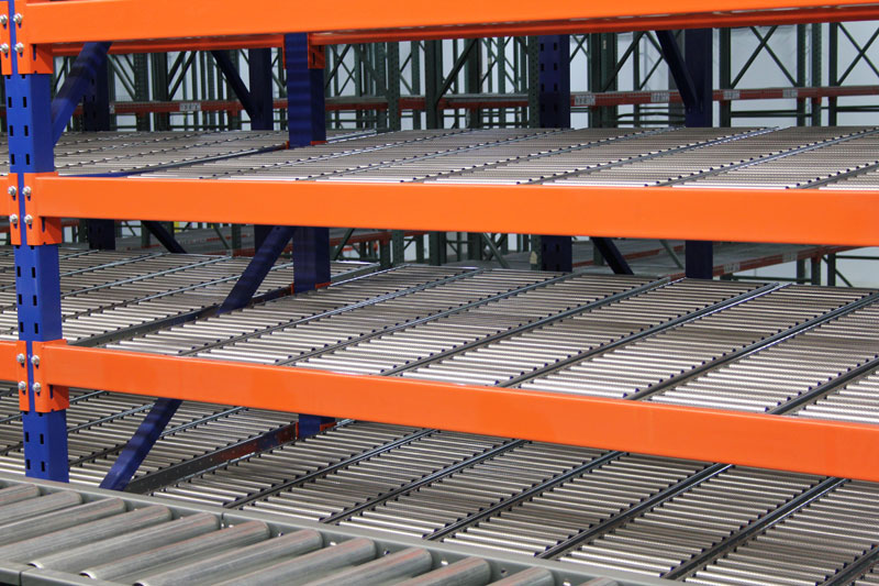 Photos of RhinoTrac Carton Flow Rack full-width conveyor style rollers