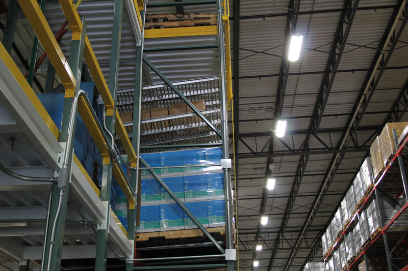 Photos of RhinoTrac Carton Flow Rack full-width conveyor style rollers